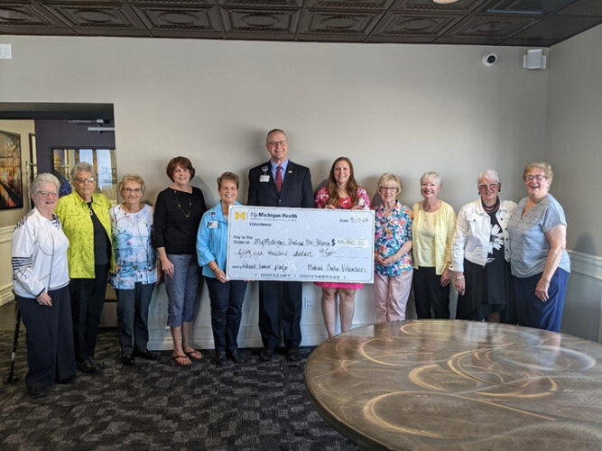 Volunteers recognized at banquet, present $55K check | News, Sports ...